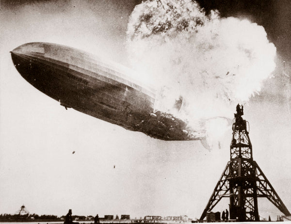 The German airship 'Hindenburg' blows up posters & prints by Anonymous