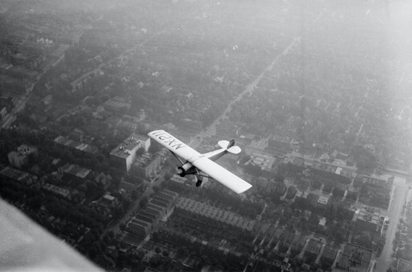 Charles Lindbergh Flying Over Landscape posters & prints by Anonymous
